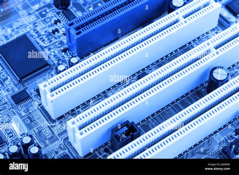 Integrated Semiconductor Microchip Microprocessor On Blue Circuit Board Representative Of The