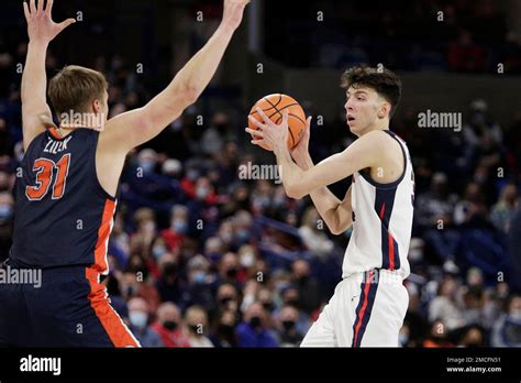 Gonzaga Center Chet Holmgren Right Controls The Ball While Defended