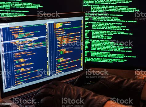 hacking of database with admin access side view of hacker hands in