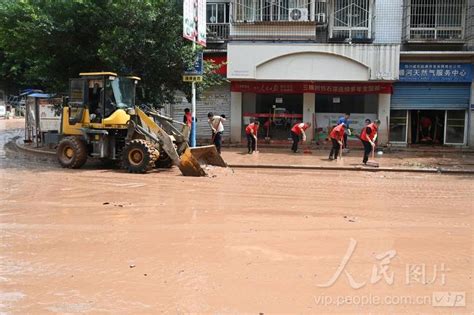 四川内江洪灾过后恢复忙 人民图片网