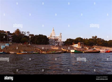 Long View Of Popular Assi Ghat With Several Pilgrims That Stands At