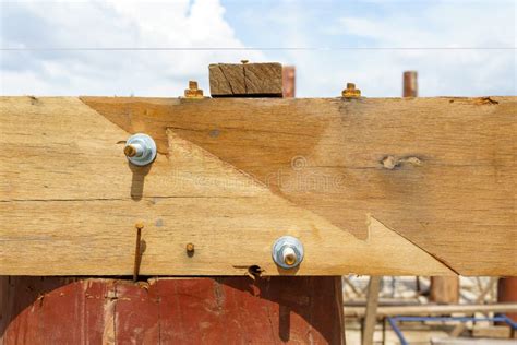 two wooden joints joined together to provide strength and bolts for a