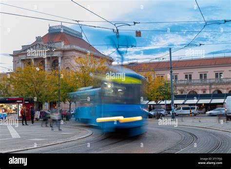 The Central Square With The Typical Blue Tram In Front Of The Glavni