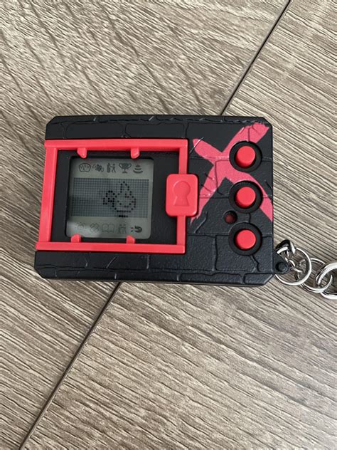 First Digivice Little Guy Started Out As Puttimon And Just Digivolved Into A Tokomon Rdigimon