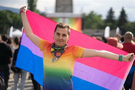waving the colors of genderfluid flag daily dialers