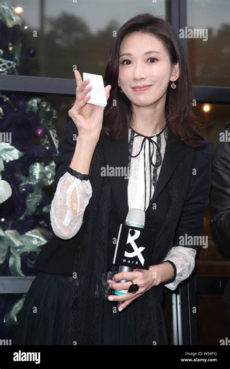 Taiwanese Model And Actress Lin Chi Ling Poses At The Opening Ceremony Of An Hair Salon In