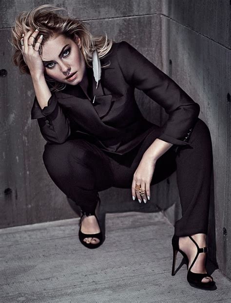 Elisha Cuthbert Wears Dark And Seductive Looks For Fashion Shoot