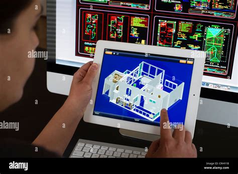 architect using ipad cad computer aided design application to model