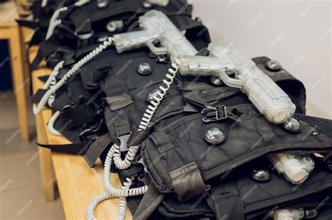 Premium Photo Weapons Closeup On A Military Man Standing Inside The