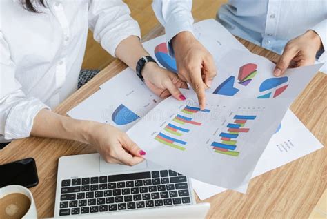 Business Team Work Analyzing Charts Network Technology World The Desk Notebook On Wood Table