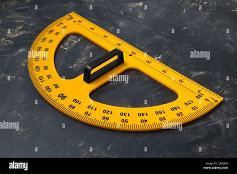 Protractor With Measuring Length And Degree Markings On Blackboard Stock Photo Alamy