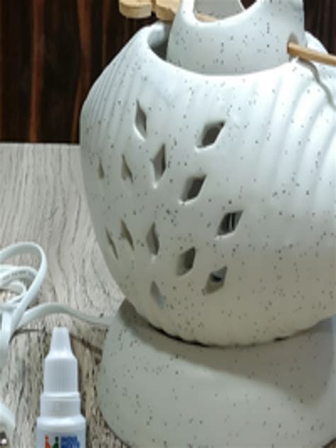 Buy India Meets India White Shankh Shape Ceramic Electric Aroma Buy India Meets India White Shankh Shape Ceramic Electric Aroma