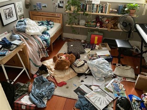 A Messy Bedroom With Lots Of Clutter On The Floor And Stuffed Animals