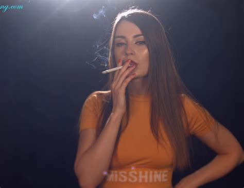 Smoking All White 120s While Wearing Jeans And Crop Top Anna Smoking