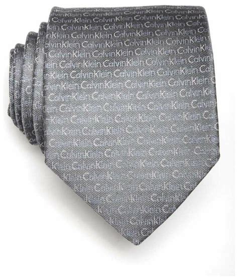 Купить Серый галстук с логотипами Calvin Klein 2185 за 6300р. с доставкой