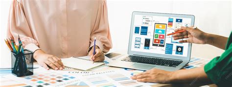 Premium Photo Designer Recommends Color While Laptop Displayed Ui And
