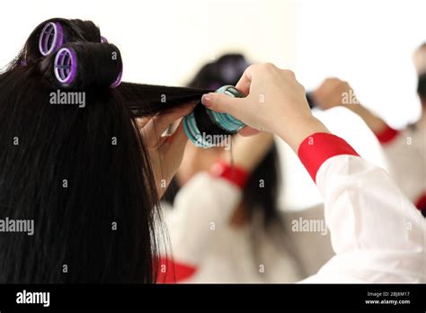 Beautiful Woman Making Curls Stock Photo Alamy