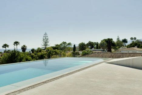 Watch Swimmers Through The Glass Floor Of This Amazing Cantilevered