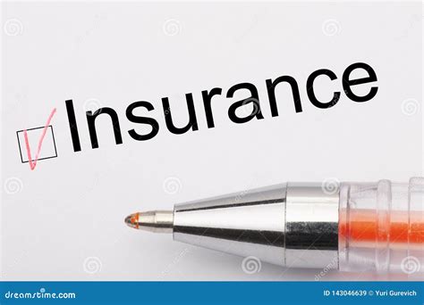 Insurance Checkbox With A Tick On White Paper With Metal Pen