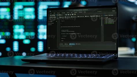 Focus On Laptop Used By Engineers Coding In Modern Data Center Monitoring Security Threats