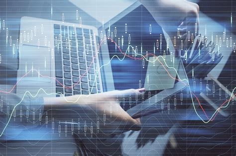 premium photo double exposure of businesswoman hands typing on computer and financial graph