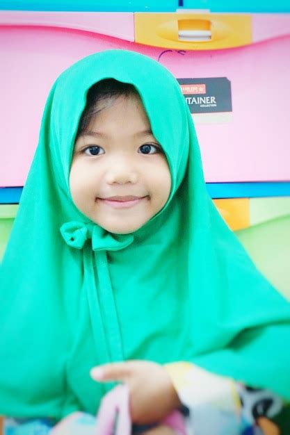 Premium Photo Portrait Of Cute Girl Wearing Hijab At Home