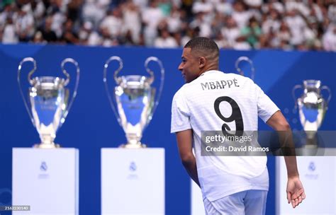 Real Madrid New Signing Kylian Mbappe Walks Past The Uefa Champions