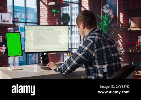 Software Engineer At Computer Coding Creating Software Using Isolated Screen Tablet It