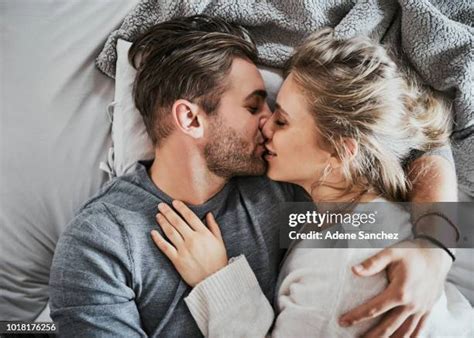 Couple Making Out In Bed Photos And Premium High Res Pictures Getty