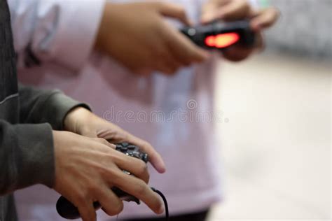 Trying New Console Games Using Joysticks At Game Expo Stock Image Image Of Modern Control