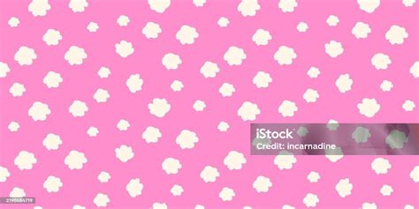 밝은 분홍색 배경에 흩어져 있는 흰 구름 모양이 있는 장난기 넘치는 원활한 패턴 어린이용 디자인 대담한 벽지 문구류 쾌활하고 창의적인 프로젝트를 위한 평범한 미니멀리스트