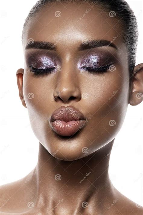 A Stunning Beauty Shot Featuring Glittery Makeup Paired With An Elegant