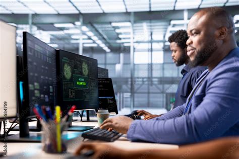 Teamworking Technicians In Data Center Getting Access Granted