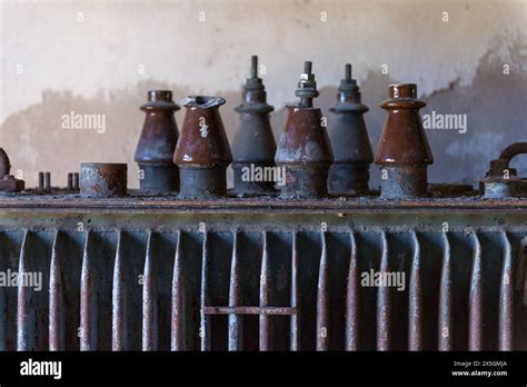 A Row Of Old Rusted Metal Objects Sit On A Table The Objects Are All