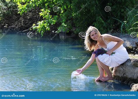 Girl Squirting Water At The Lake Royalty Free Stock Image Image 29578626