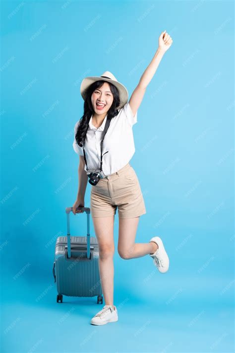 Premium Photo Portrait Of Beautiful Asian Girl Traveling Isolated On