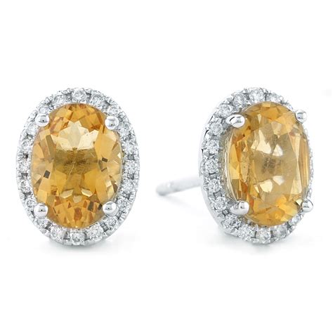 Oval Citrine Diamond Halo Earrings In White Gold New York Jewelers