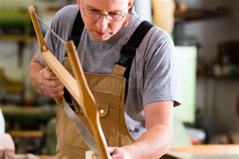 Carpenter Using Hand Saw Stock Image Image Of Occupation 92679967