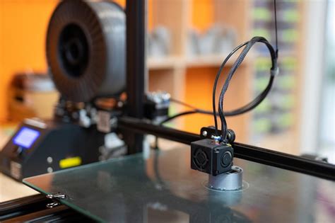 Premium Photo Closeup Of The Print Head Of The 3d Printer