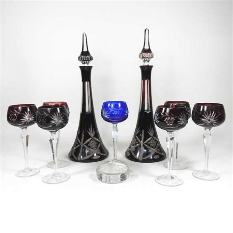 Lot 649 A Suite Of Ruby Overlaid Glasses