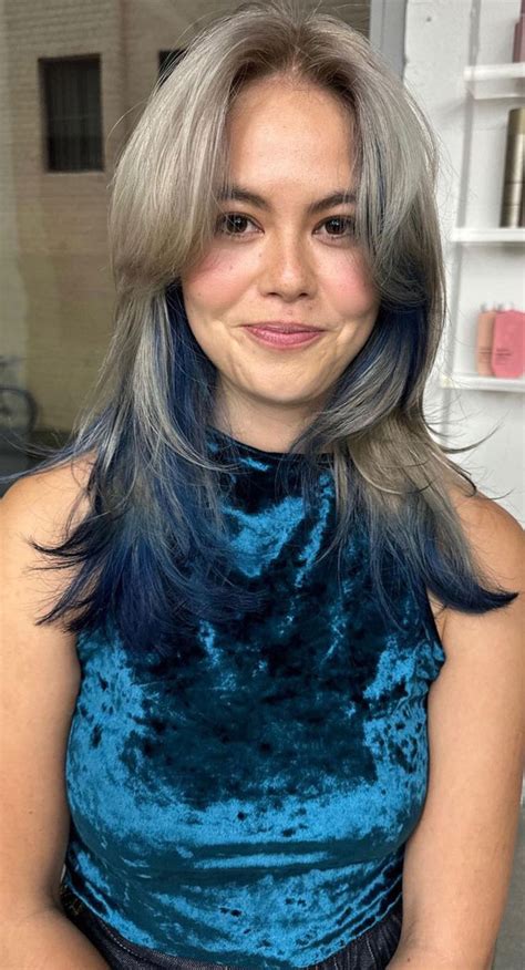 Ash Blonde With Blue Accents Long Layered Haircut And Curtain Bangs
