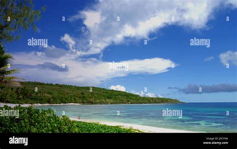 Beautiful Blue Skies And Pristine Waters Welcome Visitors To The