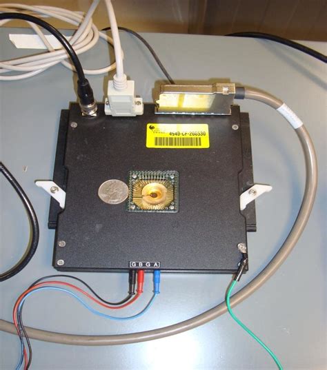 An Image Showing A Microelectrode Array Mea Mounted On An Download Scientific Diagram