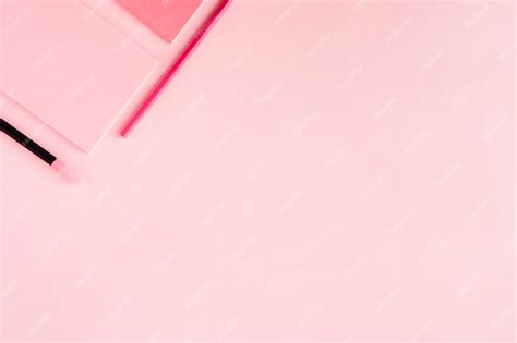 Free Photo Pink Composition With Stationery On Colored Background