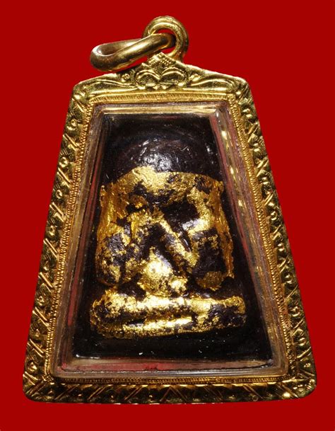 พระปิดตาหลังตะแกรง หลวงปู่เหมือนวัดกำแพง ชลบุรี พร้อมเลี่ยมทอง พระเครื่อง พระแท้ Webpra เว็บ พระ คอม