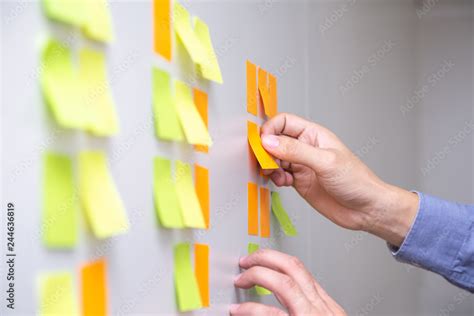 It Worker Tracking His Tasks On Kanban Board Using Task Control Of