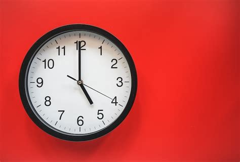 Premium Photo Classic Black And White Analog Clock On Red