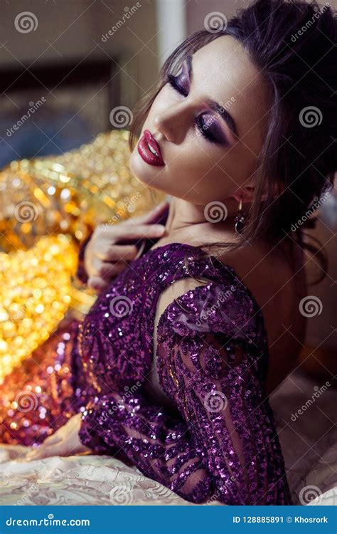 Seductive Woman In Evening Dress Hairstyle And Hollywood Makeup With