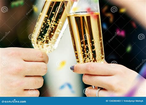 Celebration Hands Holding The Glasses Of Champagne And Wine Making A