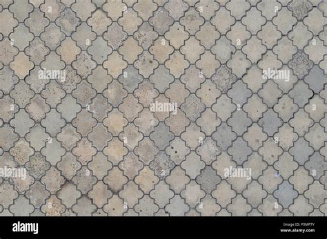 The Texture Of A Rhythmic Mosaic Made Of Concrete Tiles Background Image Of A Large Area Of Old